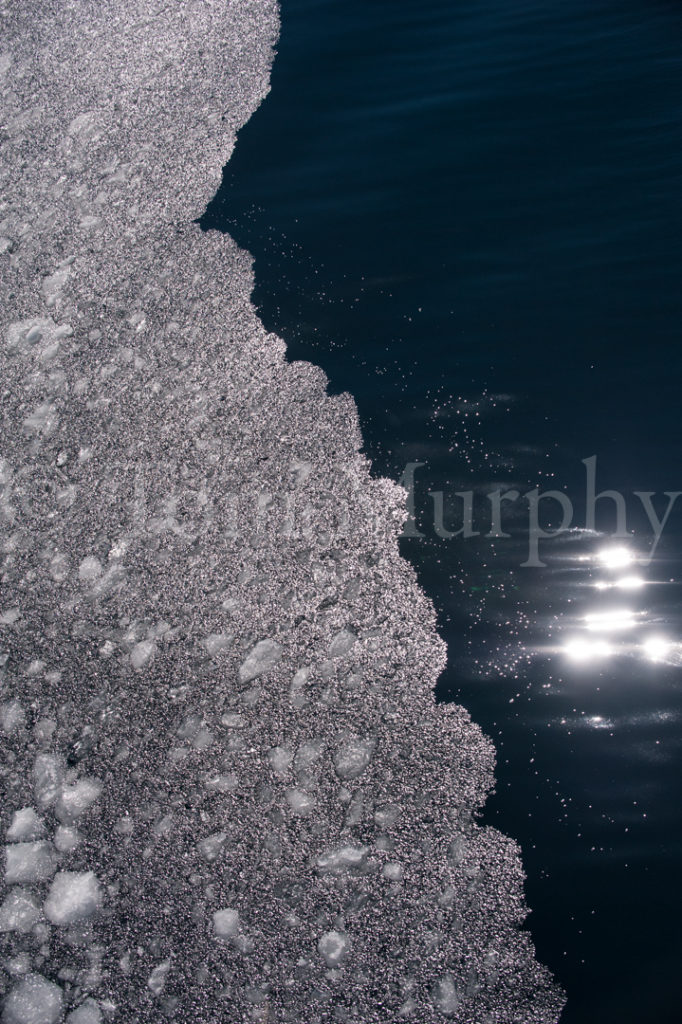 Ice Water Edge Sun Reflection – Tom Murphy Photography